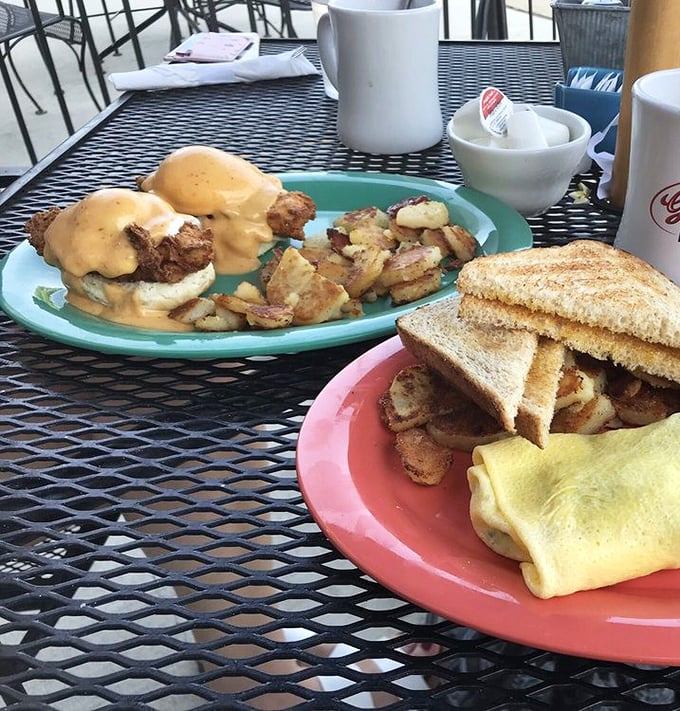 Breakfast royalty: Eggs Benedict with crispy home fries. The kind of plate that makes you want to cancel your plans for the day.
