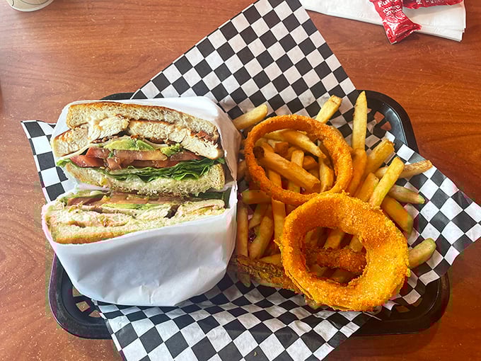A sandwich that doesn't need a fancy pedigree to prove its worth—just fresh ingredients and the courtesy of being cut into triangles.