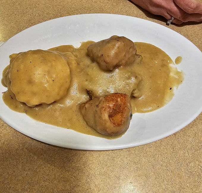 Chicken croquettes swimming in gravy—the kind of dish your grandmother would approve of, especially if your grandmother was a culinary genius.