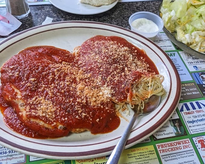 Chicken parmesan that would make any Italian grandmother nod in approval. Red sauce this good doesn't need a passport to prove its authenticity.