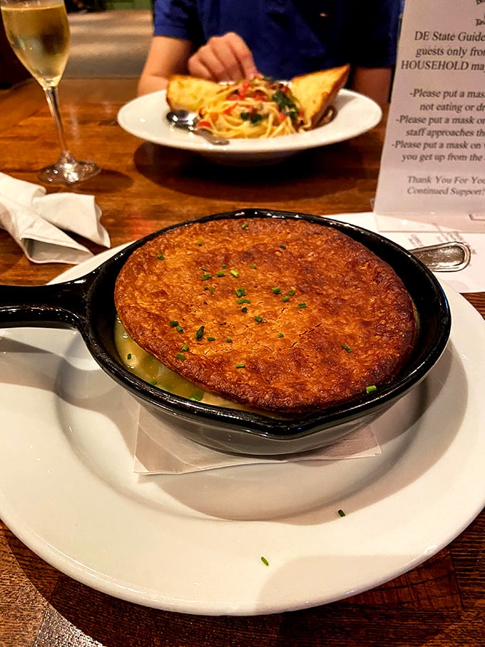 A savory pot pie that arrives at your table bubbling with promise – comfort food that's worth every delicious calorie.