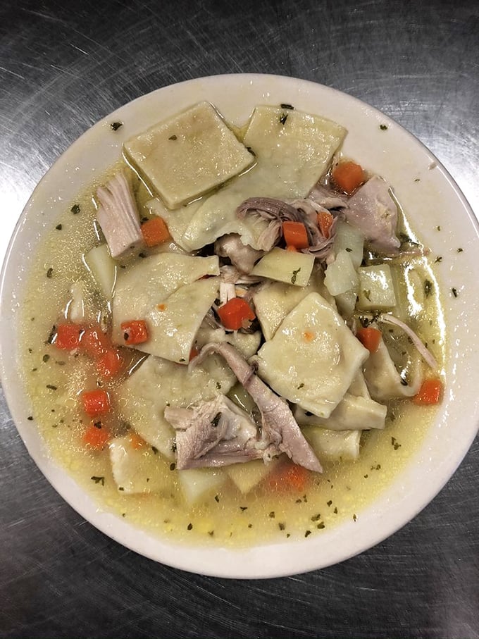 Pennsylvania Dutch pot pie defies expectations—square noodles and tender chicken swimming in broth rather than hiding under crust. Comfort food engineering at its finest.