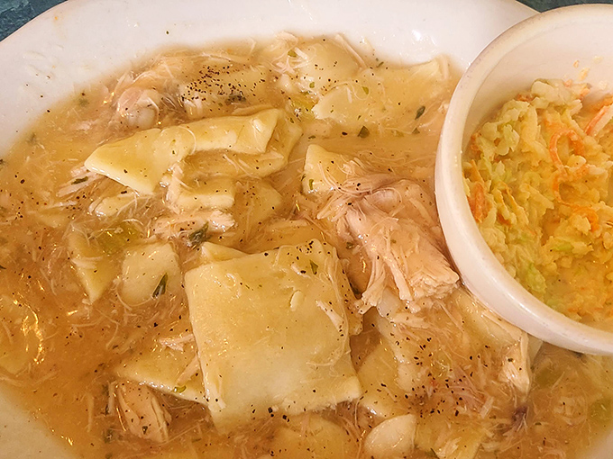 Behold the legendary chicken pot pie – square noodles swimming in golden broth with tender chicken. This isn't just soup; it's Pennsylvania Dutch soul in a bowl.