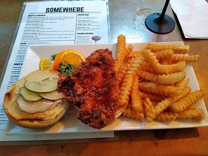 This isn't just a chicken sandwich; it's a masterclass in texture—crispy coating, juicy meat, and house-made pickles that'll make you question all other sandwiches.