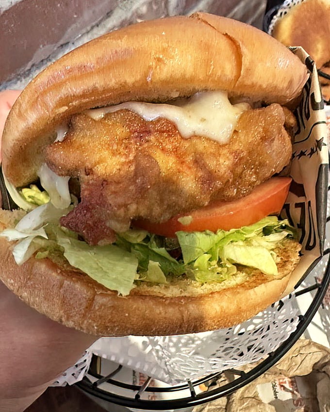 The sandwich that launched a thousand cravings. Crispy chicken, fresh veggies, and melty cheese create the holy trinity of handheld perfection.