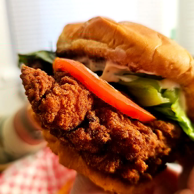Even the chicken sandwich gets the coastal treatment, fried to golden perfection and dressed with fresh veggies on a pillowy bun.