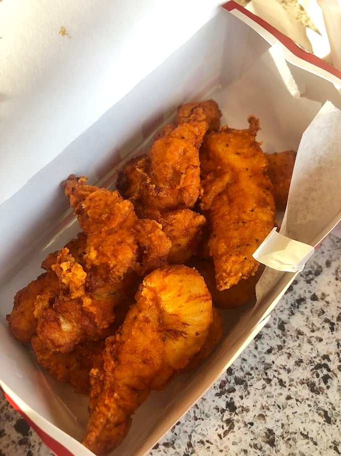 Chicken tenders that actually deserve the name – crispy, substantial, and nothing like their sad fast-food cousins. Dipping sauce optional but recommended.