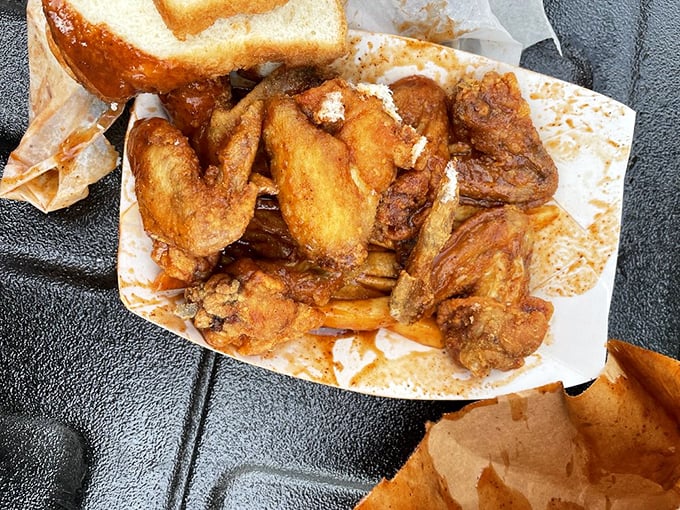 The wings emerge from Lem's kitchen with skin crackling like nature's perfect wrapping paper for the juicy gift waiting underneath.