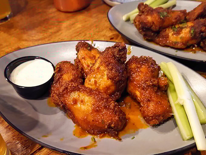 These wings aren't just crispy—they've achieved that mythical balance of crunch and tenderness that keeps you reaching for "just one more" until they're gone.
