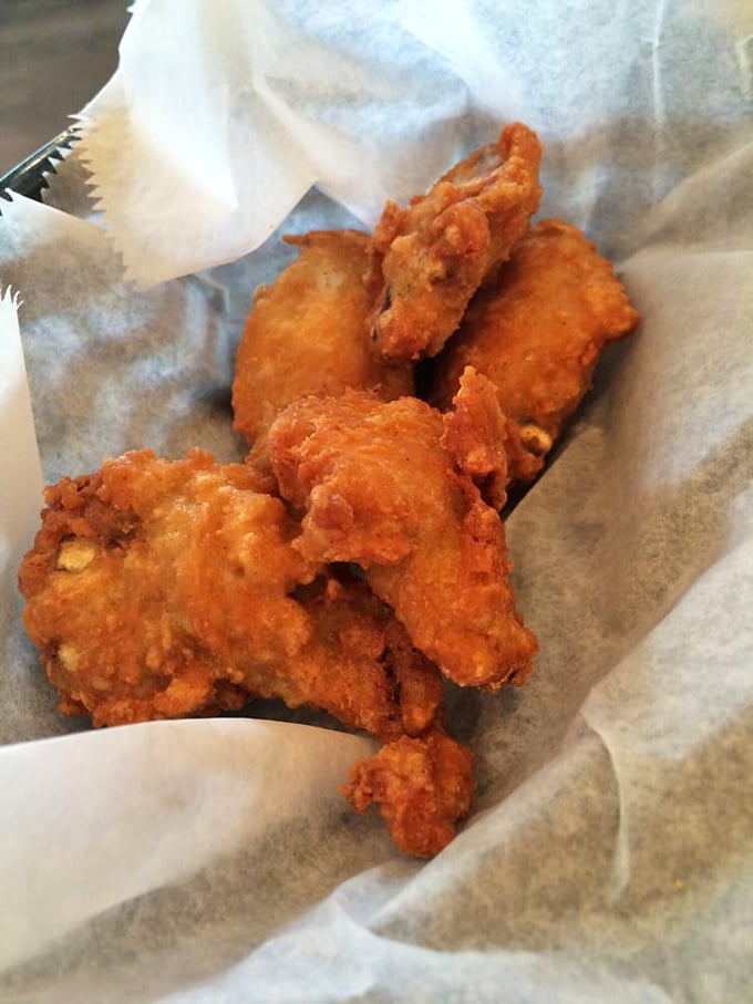 These chicken tenders aren't just fried, they're transformed—crispy armor protecting juicy meat that's begging to meet a waffle.