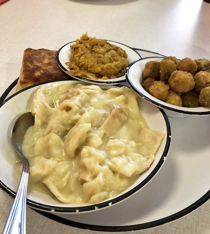 Chicken and dumplings so comforting they could end family feuds—pillowy dough islands floating in a sea of savory goodness that grandma would approve of. 
