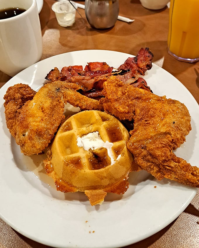Chicken and waffles: the culinary equivalent of wearing pajamas to a black-tie event—unexpectedly perfect and absolutely delicious.