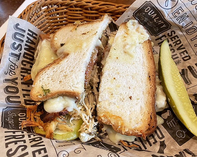 A grilled cheese that's having an identity crisis in the best possible way—melty cheese, savory fillings, and bread toasted to golden perfection.