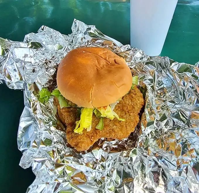 This chicken sandwich doesn't need fancy aioli or artisanal bread to make its statement – just honest crispiness and a bun that knows its supporting role.