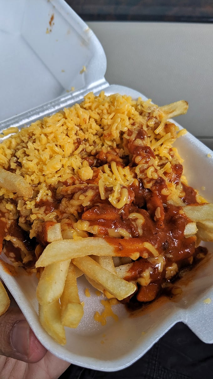 Chili cheese fries: where utensils become optional and napkins become mandatory. A delicious mess worth every bit of cleanup afterward.