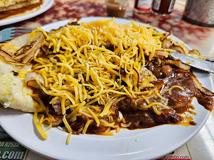 When chili and cheese join forces with eggs, breakfast becomes a delicious rebellion against boring mornings.