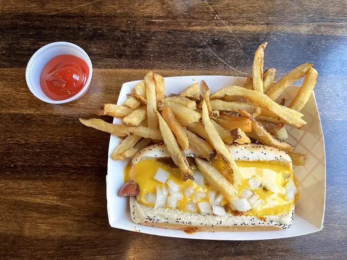 Cheese, chili, and a perfectly nestled hot dog – comfort food that doesn't need a fancy pedigree to make you feel like you've come home.