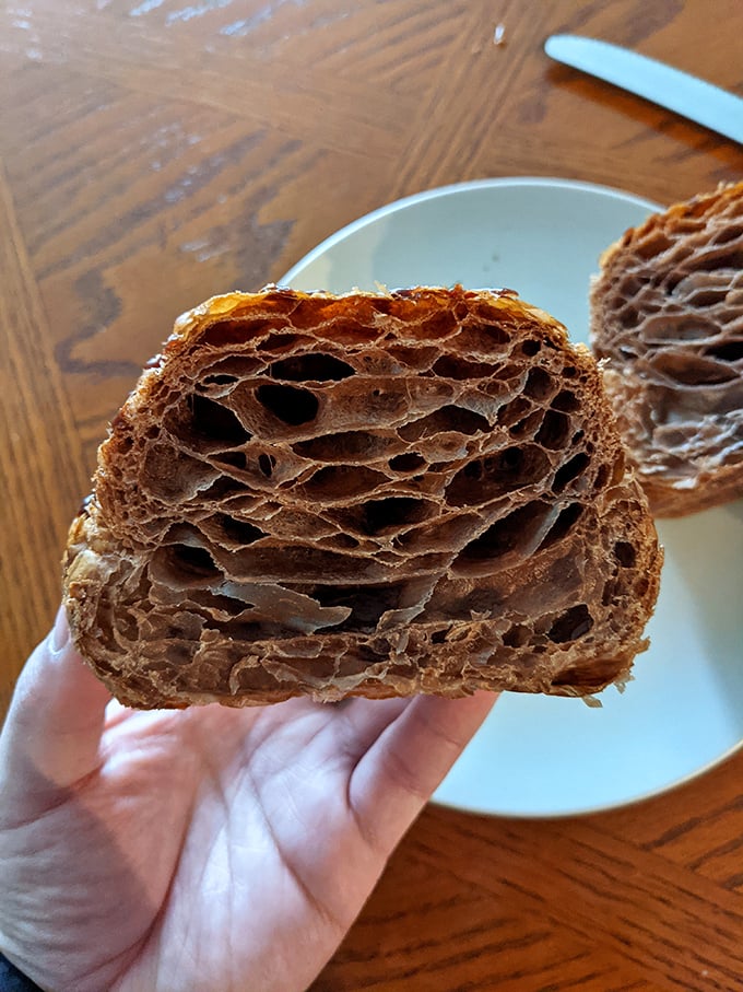 The holy grail of pastry architecture—those honeycomb layers reveal the patient craftsmanship behind every perfect bite.