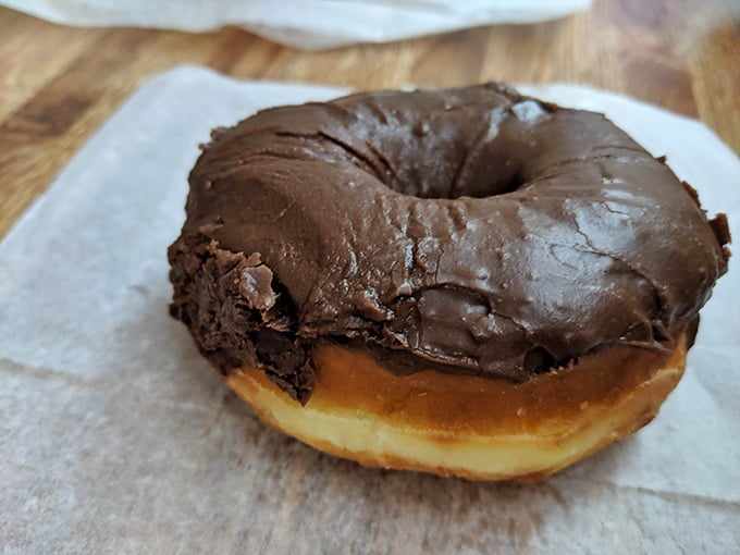 The chocolate glazed—proof that simplicity can be revolutionary. This isn't just a donut; it's a masterclass in restraint and indulgence.