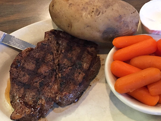 That chopped sirloin steak with its perfect grill marks is the strong, silent type of entrée - no fancy sauce needed, just honest beef.