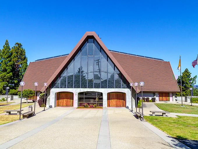 Architectural drama meets spiritual sanctuary in this striking A-frame structure that reaches skyward like hands in prayer.