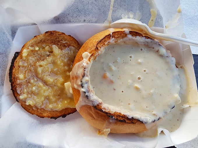 Clam chowder served in a bread bowl—the ultimate edible dishware innovation. Creamy, hearty, and when you're done with the soup, the real bonus round begins.