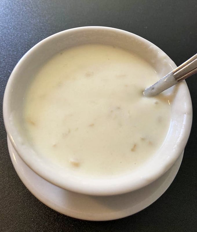 New England clam chowder done right in Florida—creamy, packed with tender clams, and guaranteed to trigger involuntary "mmm" sounds with every spoonful.