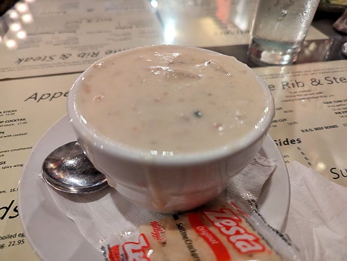 This isn't just soup—it's a bubbling cauldron of comfort with cheese stretching to the heavens. Spoon-breaking cheese pull guaranteed.