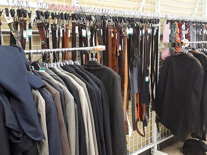 The accessories wall—where belts that have held up other people's pants now wait patiently for your loops.
