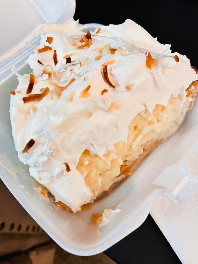 Coconut cream pie that would make your grandmother both proud and jealous. Those toasted coconut flakes aren't just garnish—they're little crunchy love letters.