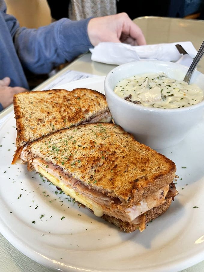 The perfect sandwich-soup combo – where the bread is toasted to golden perfection and the soup looks like it could cure whatever ails you.