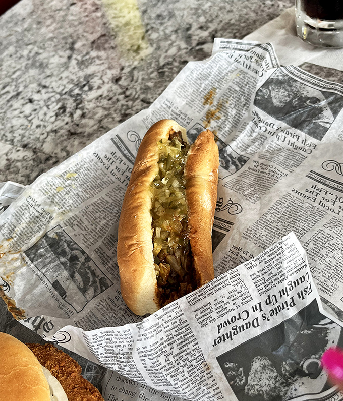 The Chicago-style hot dog—where every topping has earned its place through decades of delicious democracy. That relish green is practically neon with flavor.