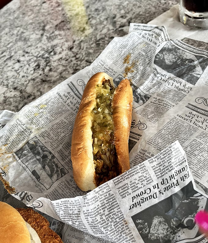 The Chicago-style hot dog—where every topping has earned its place through decades of delicious democracy. That relish green is practically neon with flavor.