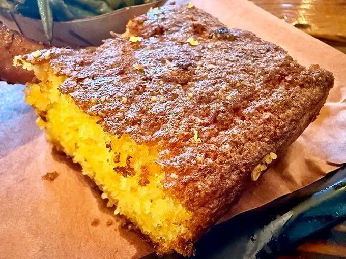 This cornbread isn't just a side—it's the golden child of the barbecue family, crusty on top and tender inside like a good country song.