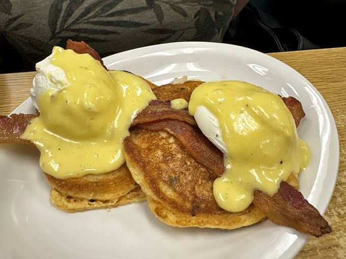 Eggs Benedict with a Southern accent—cornmeal cakes replace English muffins in this brilliant twist that makes perfect sense once you taste it.