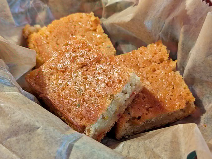 Golden cornbread that would make your grandmother both jealous and proud. Crisp edges, tender center, and enough butter to make cardiologists wince from miles away.