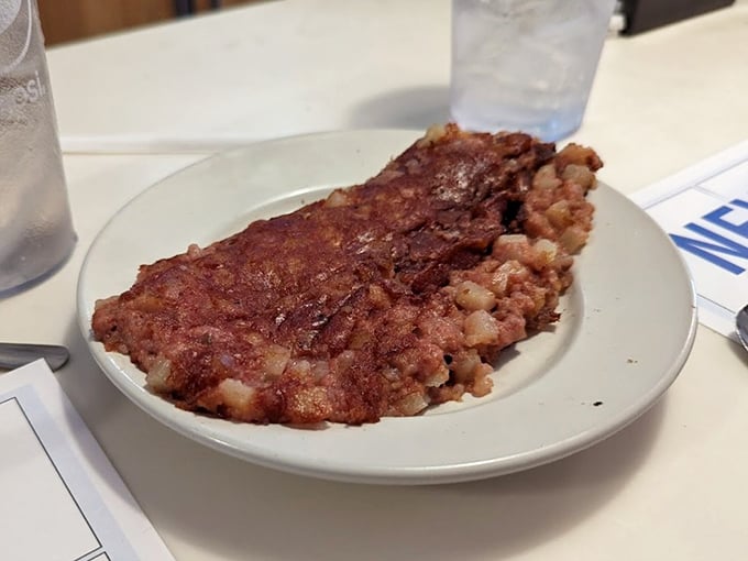 Crispy-edged corned beef hash – the breakfast of champions and late-night philosophers. A beautiful marriage of textures and flavors.