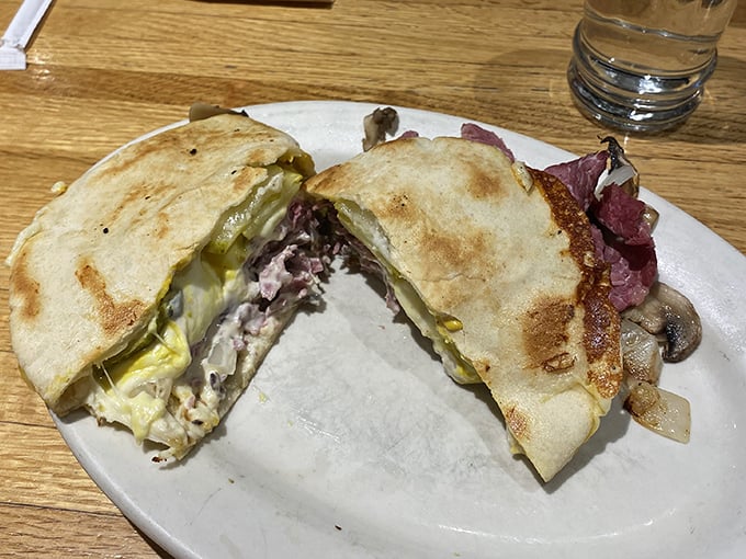 This sandwich isn't just lunch—it's architecture. Layers of deliciousness nestled between bread that knows its supporting role perfectly.