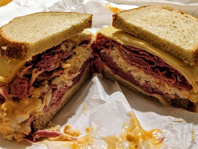 Not just any sandwich, but a masterclass in balance—corned beef, cheese, and slaw creating the kind of harmony that makes taste buds stand at attention.