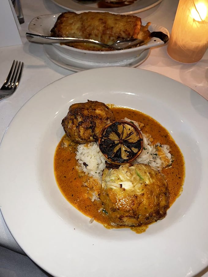 Crab cakes that actually taste like crab—what a concept! Served over rice with a sauce so good you'll consider drinking it directly.