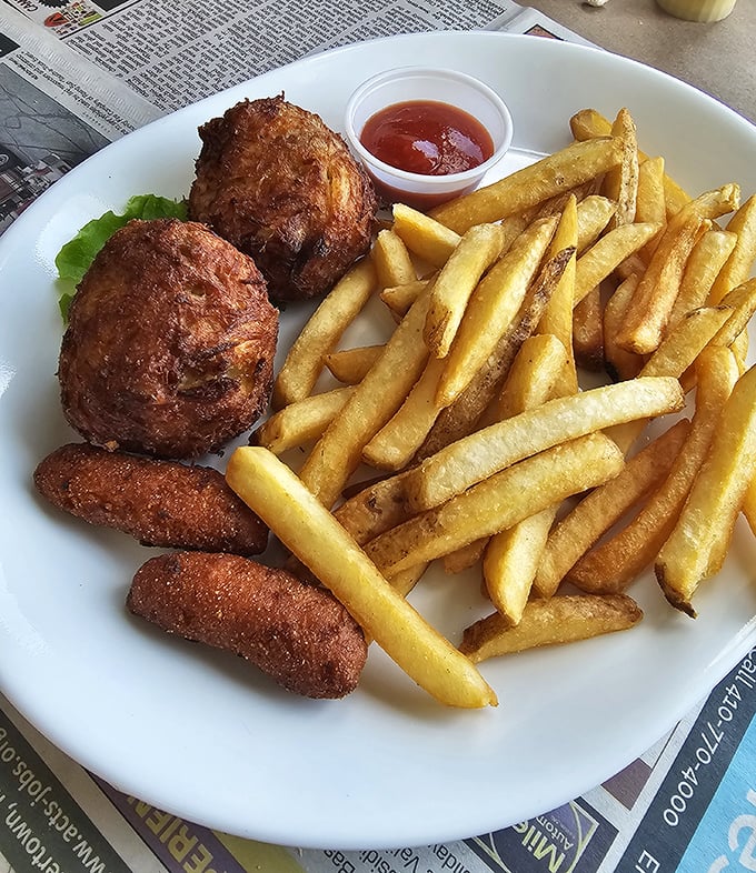 Crab cakes and fries—the dynamic duo of Delaware dining that makes you wonder why you'd ever order anything else.