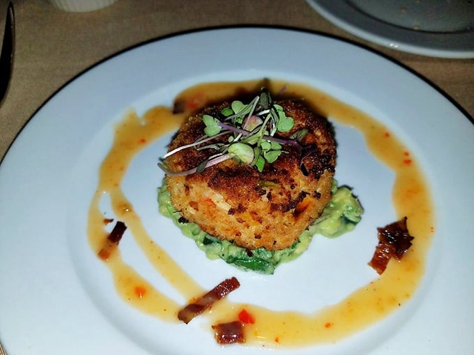 The humble crab cake, elevated to art form. Golden-crisp exterior giving way to sweet crab meat—this isn't just dinner, it's maritime poetry on a plate.