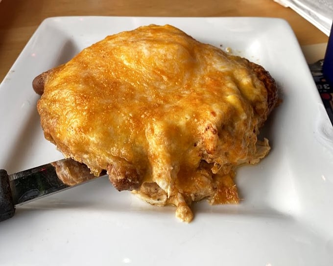 Beneath that blanket of melted cheese lies a crab-topped pretzel that makes you question why anyone would eat pretzels any other way.