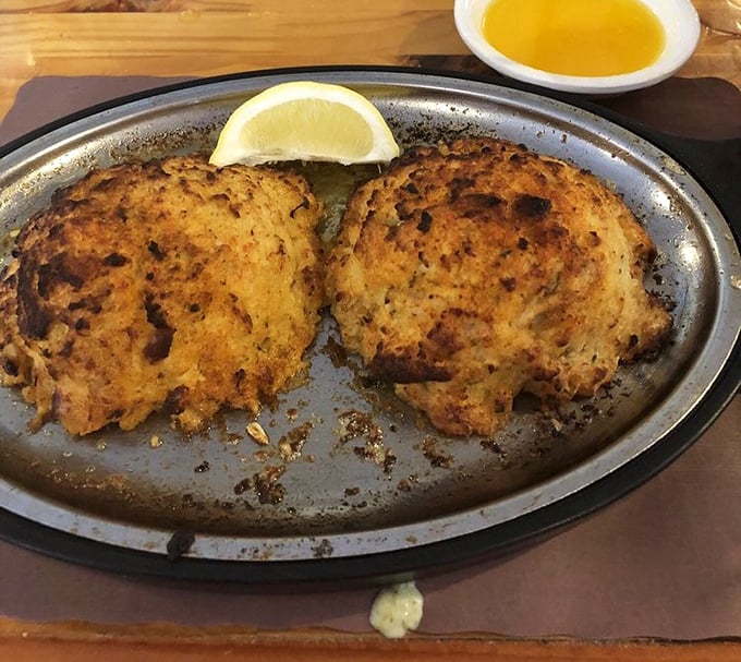 Golden-brown crab cakes with a hint of lemon—proof that simple preparation lets quality ingredients sing their own delicious song.