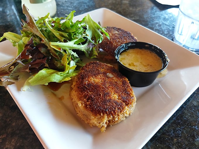 These crab cakes aren't just good, they're "text your friends immediately" good. Crispy exterior, tender inside, and that sauce!