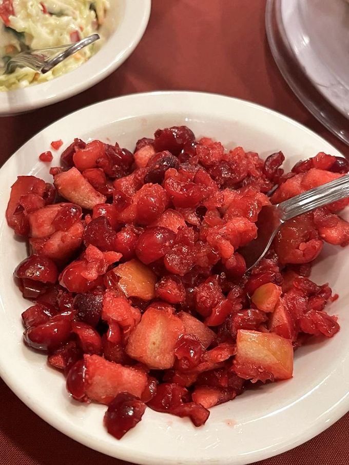 The cranberry relish brings a tart brightness that cuts through rich German fare like a well-timed joke at a serious dinner party.