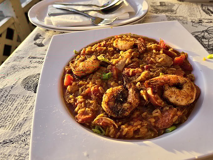 Jambalaya that tells a story with every bite—rice soaking up tomato-tinged broth while shrimp, sausage, and vegetables compete for your attention.