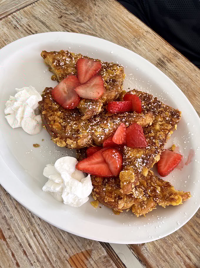 French toast that's crunchier than autumn leaves and twice as satisfying – breakfast perfection achieved with style.