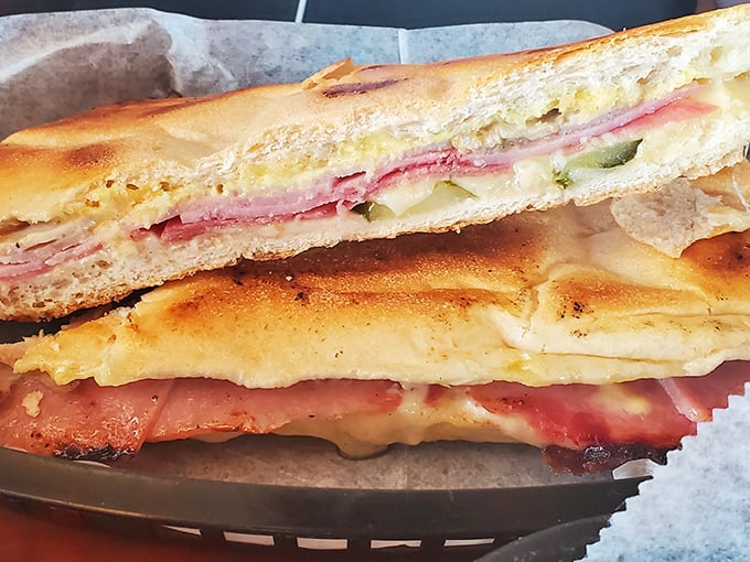 This Cuban sandwich isn't just pressed—it's been given a warm, melty hug. The perfect marriage of ham, pork, and pickles.