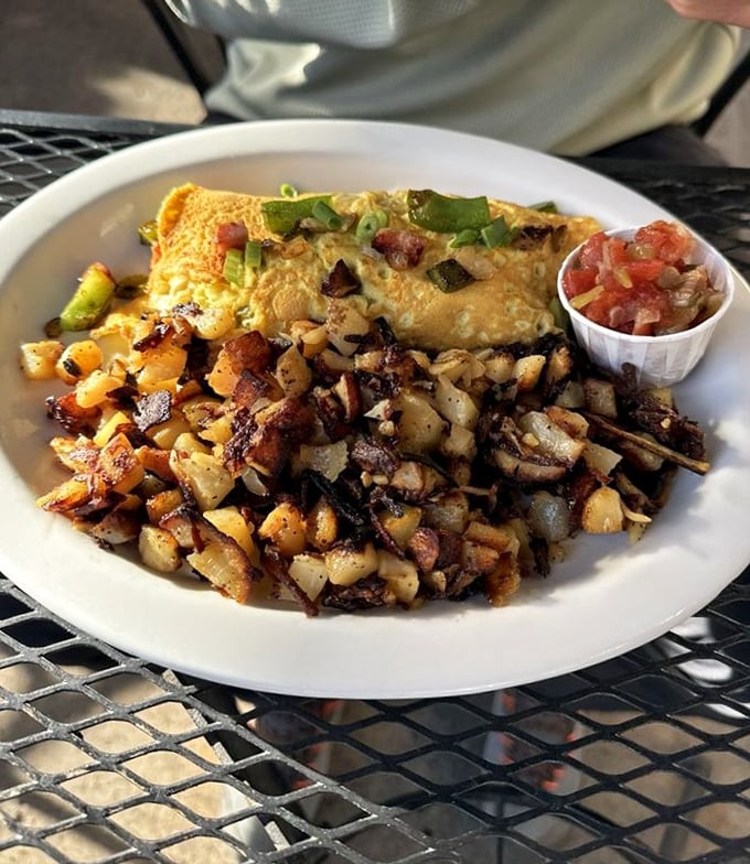 This Denver omelet with perfectly crisped potatoes isn't just breakfast – it's an edible love letter to morning.